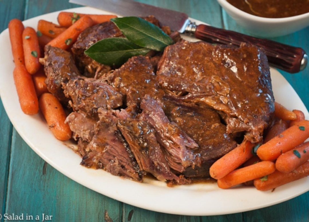 A Comforting Pot Roast with Carrots and a Savory Beef Broth