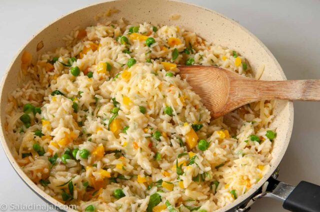 Cheesy Rice Pilaf with Peppers and Peas